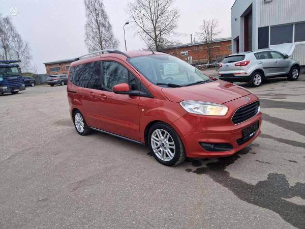 Orange Ford tourneo-courier 2014 in Ukmerge, with an engine capacity of 1.50 L and mileage of 220 thousand km for 5250 €, photo 4 on AUTOMOTO.COM.LV
