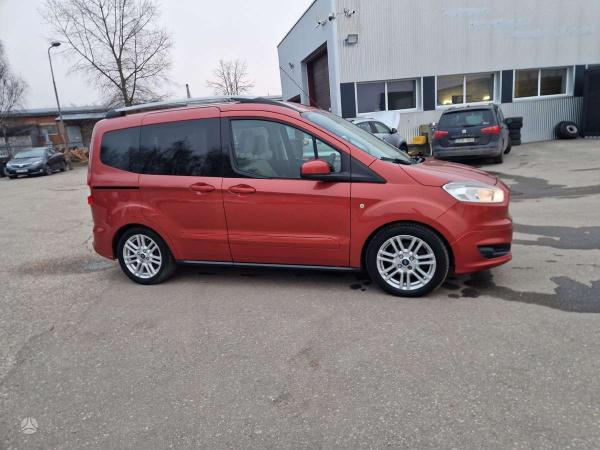 Orange Ford tourneo-courier 2014 in Ukmerge, with an engine capacity of 1.50 L and mileage of 220 thousand km for 5250 €, photo 5 on AUTOMOTO.COM.LV