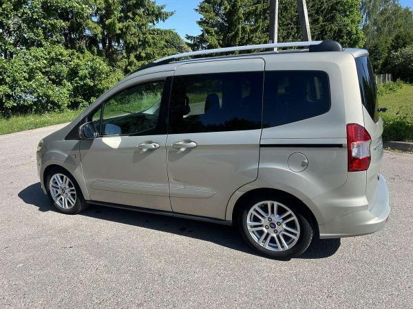 Yellow Ford tourneo-courier 2015 in Raseiniai, with an engine capacity of 1.60 L and mileage of 184 thousand km for 3650 €, photo 7 on AUTOMOTO.COM.LV