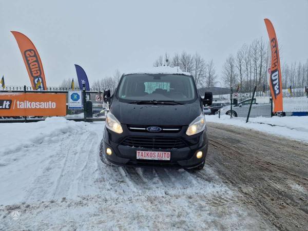 Black Ford Tourneo Custom 2013 in Kaunas, with an engine capacity of 2.20 L and mileage of 232 thousand km for 11500 €, photo 2 on AUTOMOTO.COM.LV