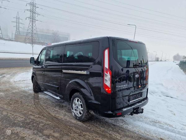 Black Ford Tourneo Custom 2013 in Kaunas, with an engine capacity of 2.20 L and mileage of 232 thousand km for 11500 €, photo 8 on AUTOMOTO.COM.LV