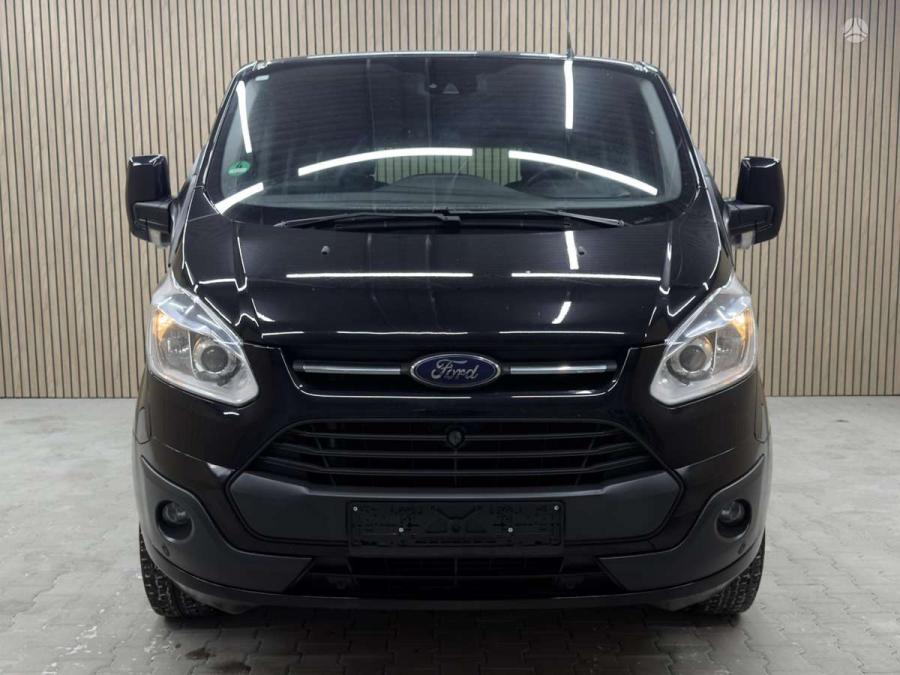 Black Ford Tourneo Custom 2013 in Marijampole, with an engine capacity of 2.20 L and mileage of 236 thousand km for 12400 €, photo 3 on AUTOMOTO.COM.LV