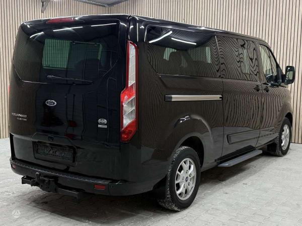 Melns Ford Tourneo Custom 2013 Marijampole, ar dzinēja tilpumu 2.20 L un nobraukumu 236 tūkst. km par 12400 €, foto 7 vietnē AUTOMOTO.COM.LV