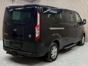 Black Ford Tourneo Custom 2013 in Marijampole, with an engine capacity of 2.20 L and mileage of 236 thousand km for 12400 €, photo 7 on AUTOMOTO.COM.LV