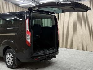 Black Ford Tourneo Custom 2013 in Marijampole, with an engine capacity of 2.20 L and mileage of 236 thousand km for 12400 €, photo 8 on AUTOMOTO.COM.LV