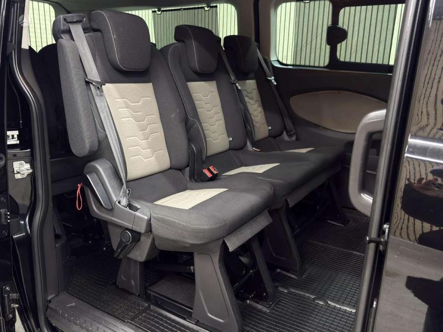 Black Ford Tourneo Custom 2013 in Marijampole, with an engine capacity of 2.20 L and mileage of 236 thousand km for 12400 €, photo 12 on AUTOMOTO.COM.LV
