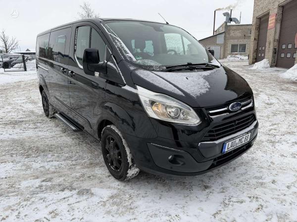Black Ford Tourneo Custom 2013 in Kretinga, with an engine capacity of 2.20 L and mileage of 303 thousand km for 8250 €, photo 2 on AUTOMOTO.COM.LV