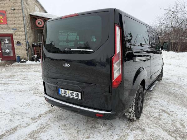 Black Ford Tourneo Custom 2013 in Kretinga, with an engine capacity of 2.20 L and mileage of 303 thousand km for 8250 €, photo 3 on AUTOMOTO.COM.LV
