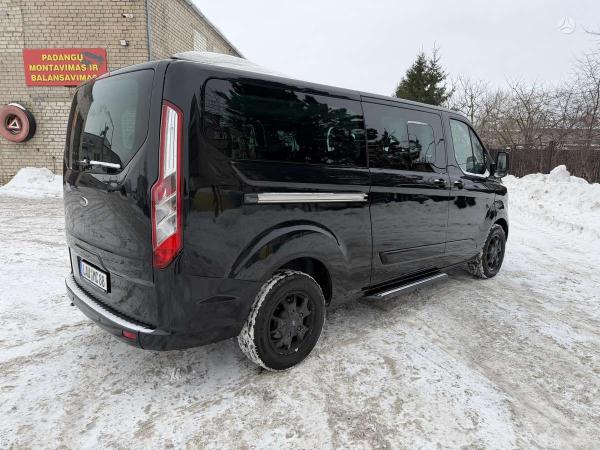 Black Ford Tourneo Custom 2013 in Kretinga, with an engine capacity of 2.20 L and mileage of 303 thousand km for 8250 €, photo 8 on AUTOMOTO.COM.LV