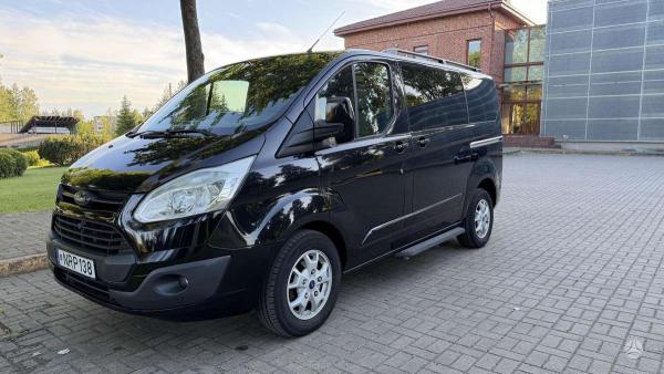 Black Ford Tourneo Custom 2014 in Marijampole, with an engine capacity of 2.20 L and mileage of 207 thousand km for 12900 €, photo 1 on AUTOMOTO.COM.LV