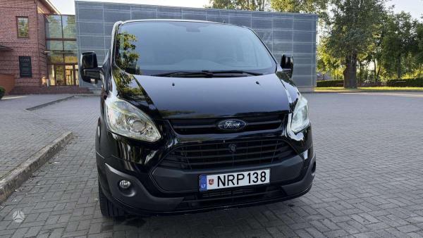 Black Ford Tourneo Custom 2014 in Marijampole, with an engine capacity of 2.20 L and mileage of 207 thousand km for 12900 €, photo 6 on AUTOMOTO.COM.LV