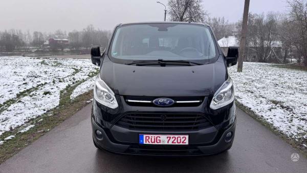 Black Ford Tourneo Custom 2015 in Kelme, with an engine capacity of 2.20 L and mileage of 285 thousand km for 14500 €, photo 2 on AUTOMOTO.COM.LV