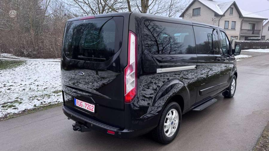 Black Ford Tourneo Custom 2015 in Kelme, with an engine capacity of 2.20 L and mileage of 285 thousand km for 14500 €, photo 5 on AUTOMOTO.COM.LV