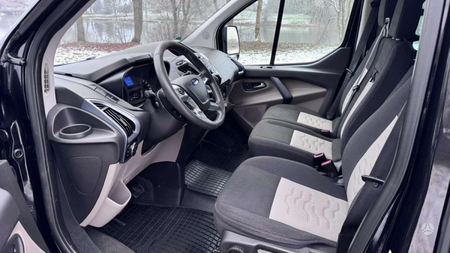 Black Ford Tourneo Custom 2015 in Kelme, with an engine capacity of 2.20 L and mileage of 285 thousand km for 14500 €, photo 9 on AUTOMOTO.COM.LV