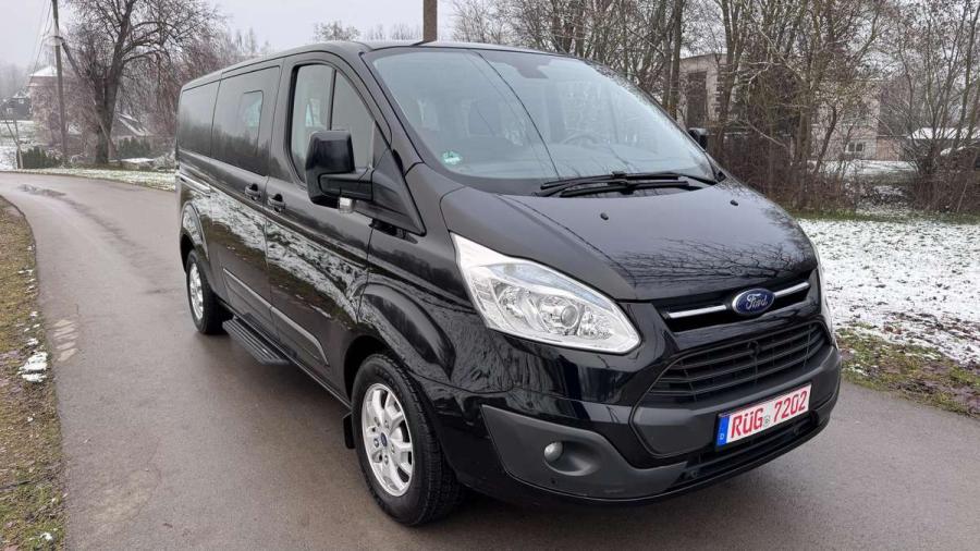Black Ford Tourneo Custom 2015 in Kelme, with an engine capacity of 2.20 L and mileage of 286 thousand km for 14400 €, photo 3 on AUTOMOTO.COM.LV