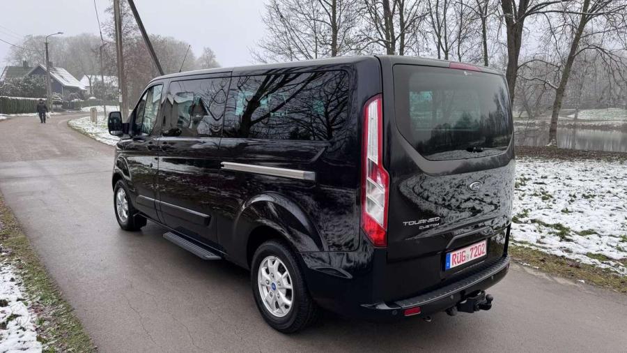 Black Ford Tourneo Custom 2015 in Kelme, with an engine capacity of 2.20 L and mileage of 286 thousand km for 14400 €, photo 4 on AUTOMOTO.COM.LV