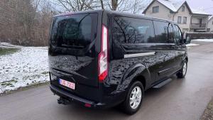 Black Ford Tourneo Custom 2015 in Kelme, with an engine capacity of 2.20 L and mileage of 286 thousand km for 14400 €, photo 5 on AUTOMOTO.COM.LV