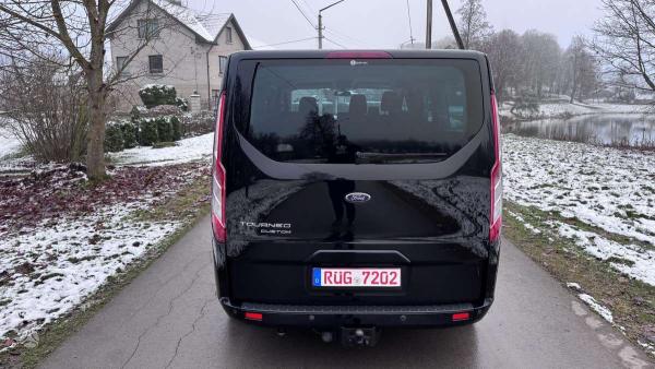 Black Ford Tourneo Custom 2015 in Kelme, with an engine capacity of 2.20 L and mileage of 285 thousand km for 13700 €, photo 6 on AUTOMOTO.COM.LV