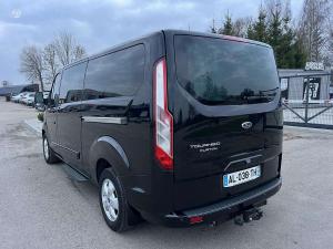 Black Ford Tourneo Custom 2016 in Taurage, with an engine capacity of 2.00 L and mileage of 300 thousand km for 13673 €, photo 7 on AUTOMOTO.COM.LV