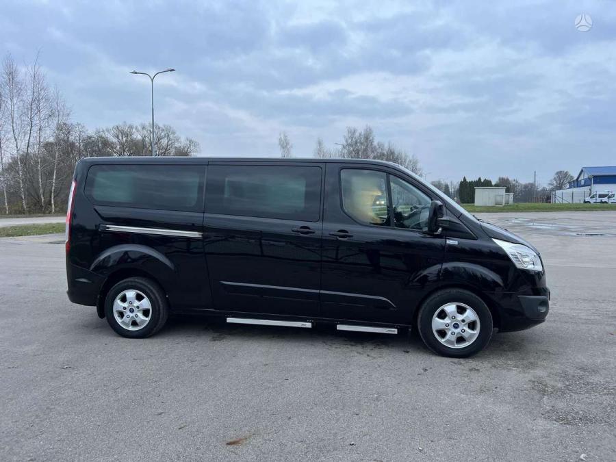 Black Ford Tourneo Custom 2016 in Taurage, with an engine capacity of 2.00 L and mileage of 300 thousand km for 13673 €, photo 27 on AUTOMOTO.COM.LV