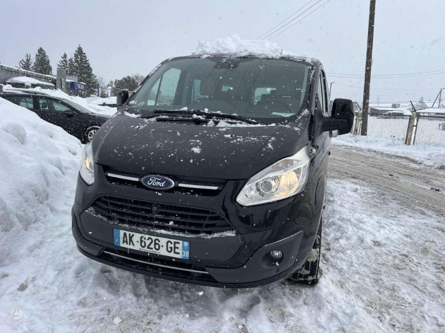 Black Ford Tourneo Custom 2016 in Taurage, with an engine capacity of 2.00 L and mileage of 300 thousand km for 11858 €, photo 8 on AUTOMOTO.COM.LV