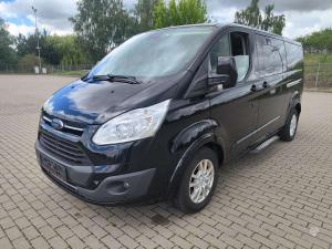 Melns Ford Tourneo Custom 2017 Marijampole, ar dzinēja tilpumu 2.00 L un nobraukumu 312 tūkst. km par 15600 €, foto  vietnē AUTOMOTO.COM.LV