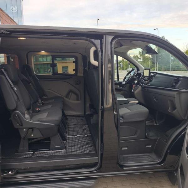 Black Ford Tourneo Custom 2018 in Utena, with an engine capacity of 2.00 L and mileage of 200 thousand km for 18200 €, photo 10 on AUTOMOTO.COM.LV