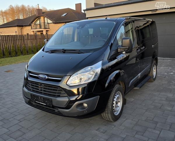 Black Ford Tourneo Custom 2013 in Druskininkai, with an engine capacity of 2.20 L and mileage of 244 thousand km for 11150 €, photo 2 on AUTOMOTO.COM.LV