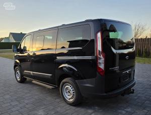 Black Ford Tourneo Custom 2013 in Druskininkai, with an engine capacity of 2.20 L and mileage of 244 thousand km for 11150 €, photo 4 on AUTOMOTO.COM.LV