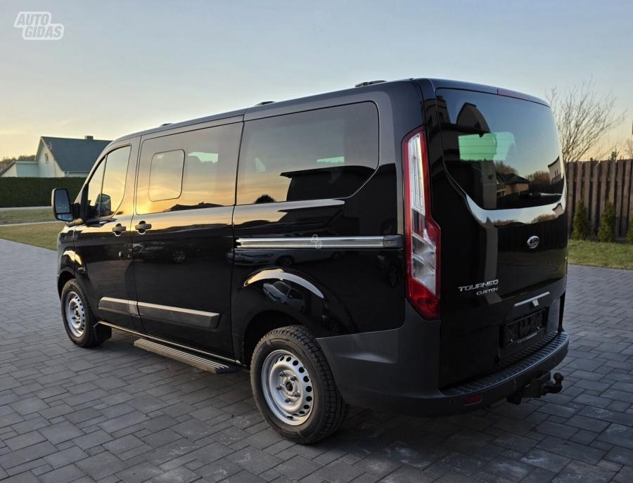 Black Ford Tourneo Custom 2013 in Druskininkai, with an engine capacity of 2.20 L and mileage of 244 thousand km for 11150 €, photo 4 on AUTOMOTO.COM.LV