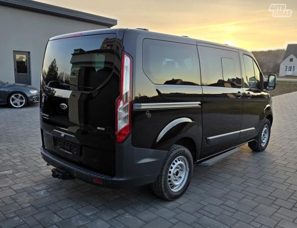 Black Ford Tourneo Custom 2013 in Druskininkai, with an engine capacity of 2.20 L and mileage of 244 thousand km for 11150 €, photo 4 on AUTOMOTO.COM.LV