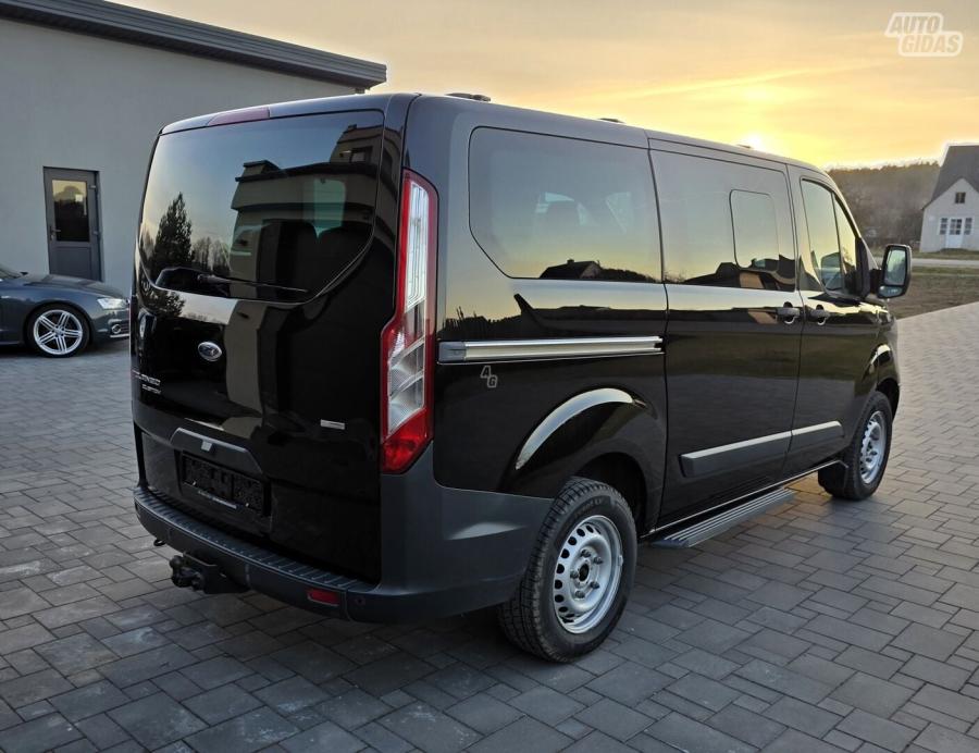Black Ford Tourneo Custom 2013 in Druskininkai, with an engine capacity of 2.20 L and mileage of 244 thousand km for 11150 €, photo 5 on AUTOMOTO.COM.LV