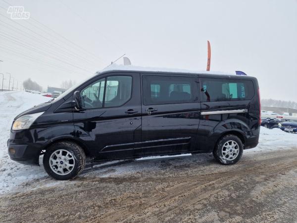 Black Ford Tourneo Custom 2013 in Kaunas, with an engine capacity of 2.20 L and mileage of 232 thousand km for 11500 €, photo 4 on AUTOMOTO.COM.LV