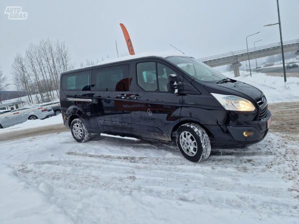 Black Ford Tourneo Custom 2013 in Kaunas, with an engine capacity of 2.20 L and mileage of 232 thousand km for 11500 €, photo 5 on AUTOMOTO.COM.LV