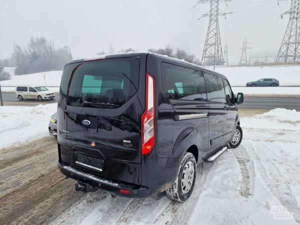 Black Ford Tourneo Custom 2013 in Kaunas, with an engine capacity of 2.20 L and mileage of 232 thousand km for 11500 €, photo 6 on AUTOMOTO.COM.LV