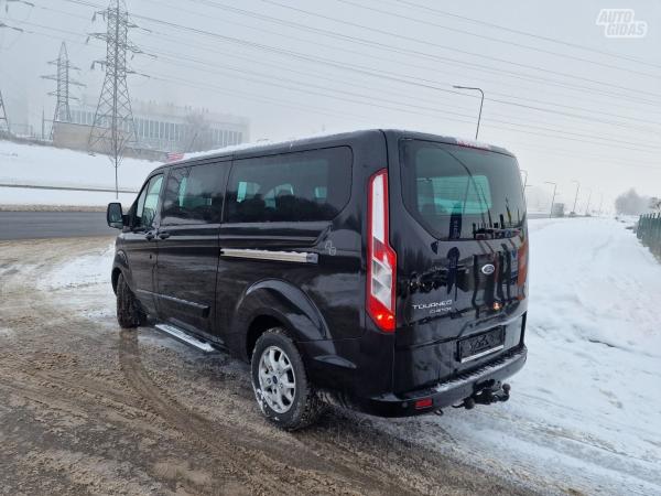 Black Ford Tourneo Custom 2013 in Kaunas, with an engine capacity of 2.20 L and mileage of 232 thousand km for 11500 €, photo 8 on AUTOMOTO.COM.LV