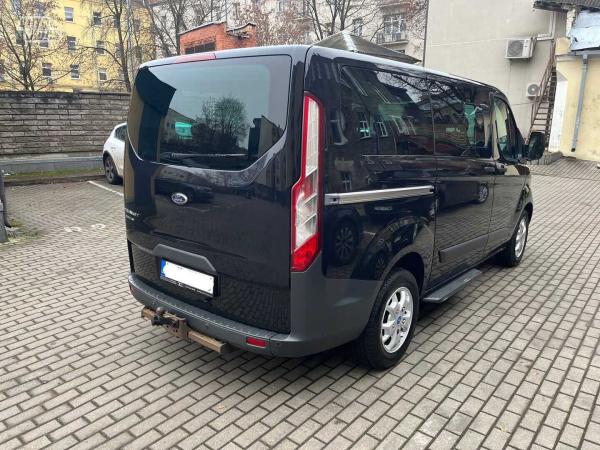 Melns Ford Tourneo Custom 2014 Viļņa, ar dzinēja tilpumu 2.20 L un nobraukumu 229 tūkst. km par 11700 €, foto 3 vietnē AUTOMOTO.COM.LV