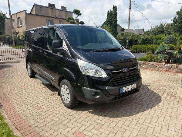Black Ford Tourneo Custom 2014 in Plunge, with an engine capacity of 2.20 L and mileage of 199 thousand km for 11500 €, photo 6 on AUTOMOTO.COM.LV