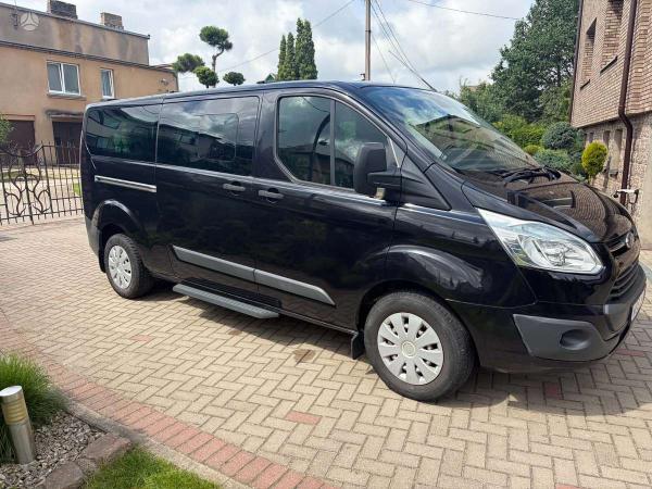 Black Ford Tourneo Custom 2014 in Plunge, with an engine capacity of 2.20 L and mileage of 199 thousand km for 11500 €, photo 7 on AUTOMOTO.COM.LV