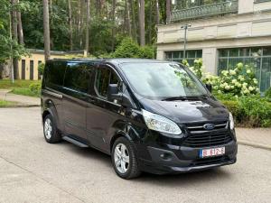 Black Ford Tourneo Custom 2015 in Riga, with an engine capacity of 2.20 L and mileage of 339 thousand km for 12550 €, photo  on AUTOMOTO.COM.LV
