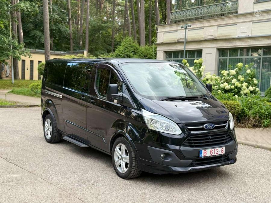 Black Ford Tourneo Custom 2015 in Riga, with an engine capacity of 2.20 L and mileage of 339 thousand km for 12550 €, photo 1 on AUTOMOTO.COM.LV
