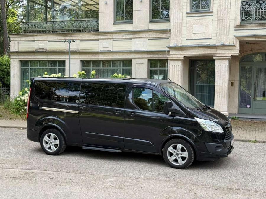 Black Ford Tourneo Custom 2015 in Riga, with an engine capacity of 2.20 L and mileage of 339 thousand km for 12550 €, photo 3 on AUTOMOTO.COM.LV