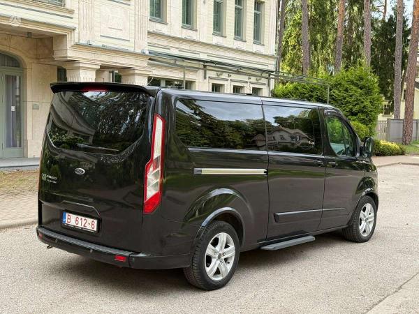 Black Ford Tourneo Custom 2015 in Riga, with an engine capacity of 2.20 L and mileage of 339 thousand km for 12550 €, photo 4 on AUTOMOTO.COM.LV
