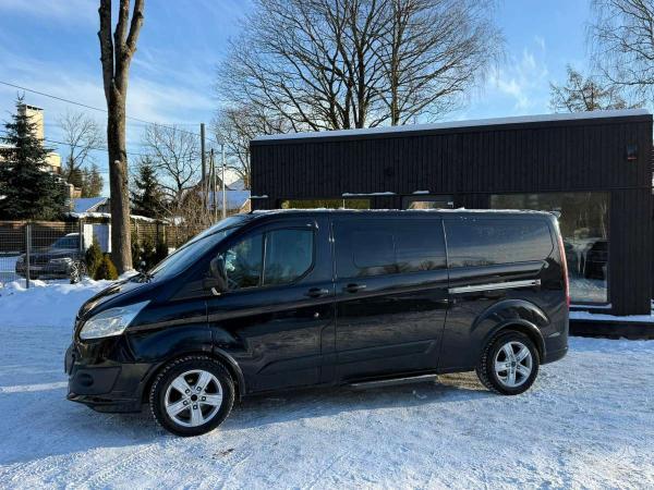 Black Ford Tourneo Custom 2015 in Riga, with an engine capacity of 2.20 L and mileage of 339 thousand km for 10999 €, photo 8 on AUTOMOTO.COM.LV
