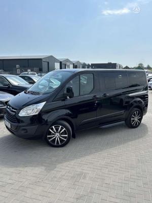 Black Ford Tourneo Custom 2018 in Kaunas, with an engine capacity of 2.00 L and mileage of 224 thousand km for 21250 €, photo 16 on AUTOMOTO.COM.LV