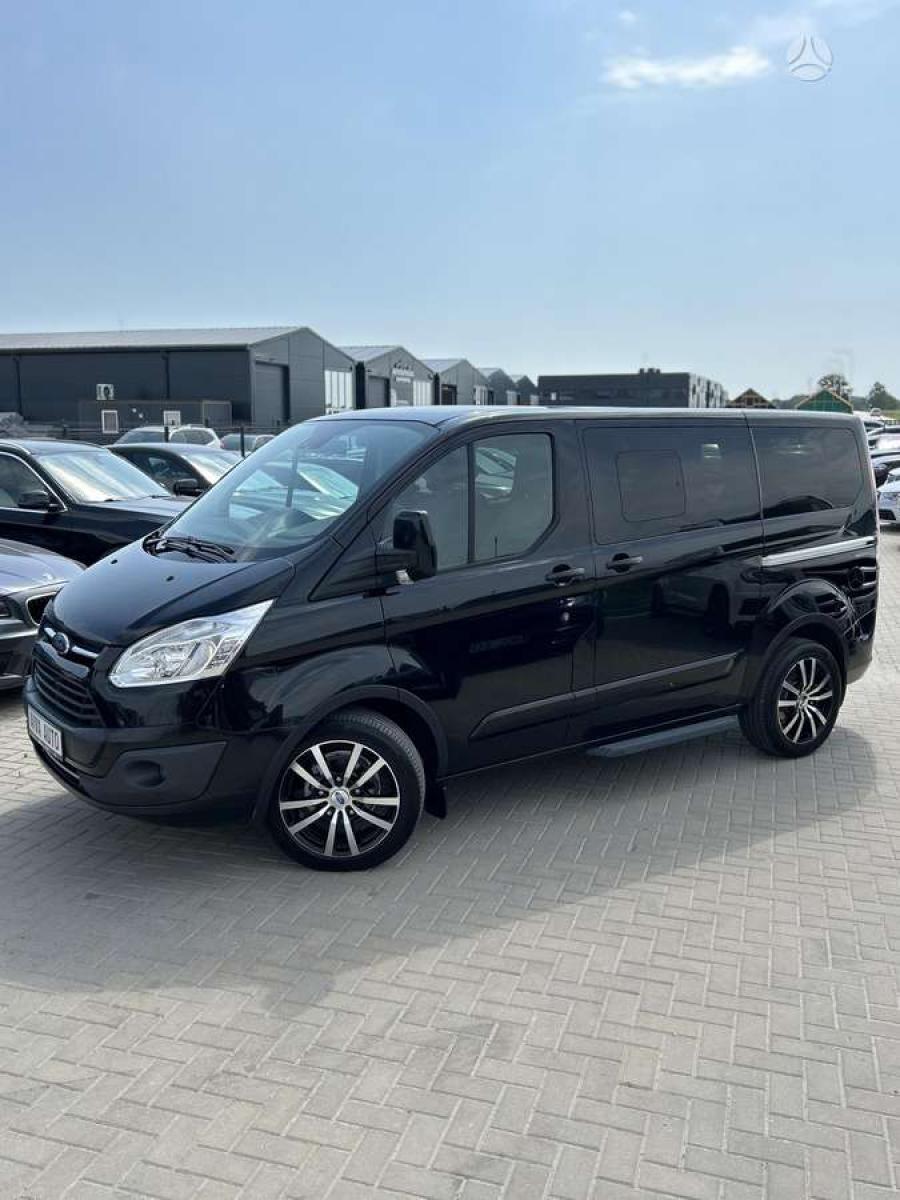 Black Ford Tourneo Custom 2018 in Kaunas, with an engine capacity of 2.00 L and mileage of 224 thousand km for 21250 €, photo 16 on AUTOMOTO.COM.LV