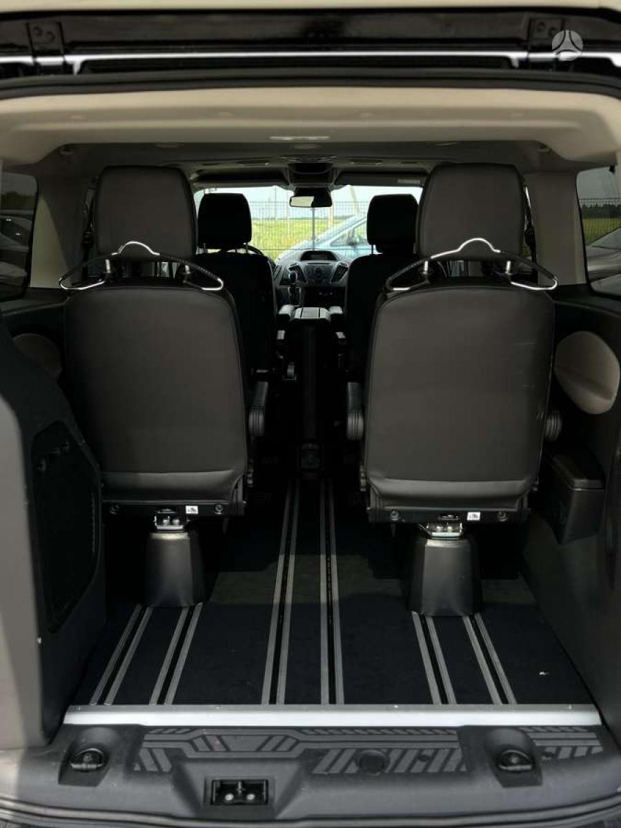 Black Ford Tourneo Custom 2018 in Kaunas, with an engine capacity of 2.00 L and mileage of 224 thousand km for 21250 €, photo 35 on AUTOMOTO.COM.LV