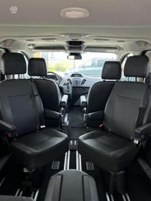 Black Ford Tourneo Custom 2018 in Kaunas, with an engine capacity of 2.00 L and mileage of 224 thousand km for 21250 €, photo 37 on AUTOMOTO.COM.LV