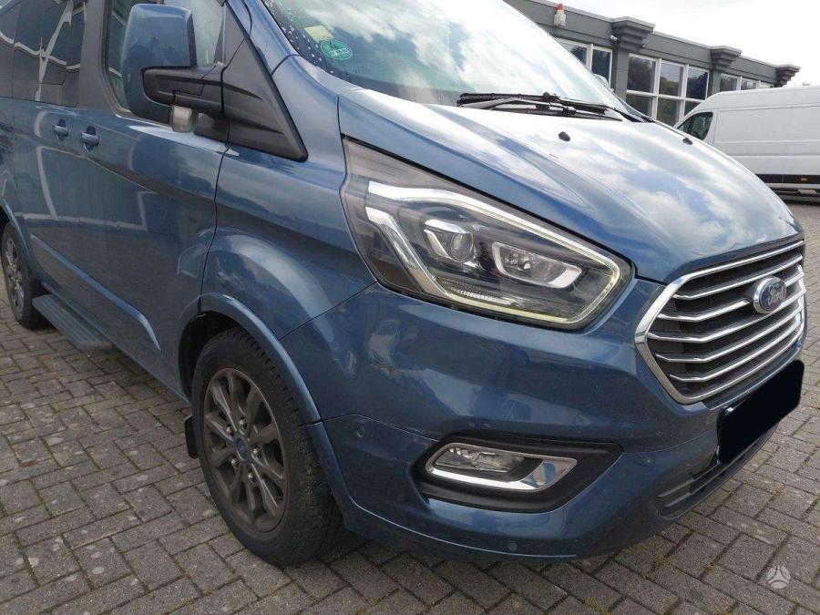 Blue Ford Tourneo Custom 2021 in Vilnius, with an engine capacity of 2.00 L and mileage of 200 thousand km for 23190 €, photo 5 on AUTOMOTO.COM.LV