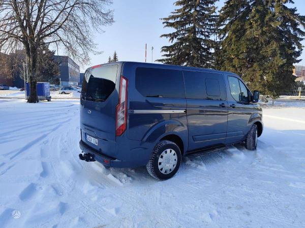 Blue Ford Tourneo Custom 2013 in Marijampole, with an engine capacity of 2.20 L and mileage of 370 thousand km for 11300 €, photo 3 on AUTOMOTO.COM.LV